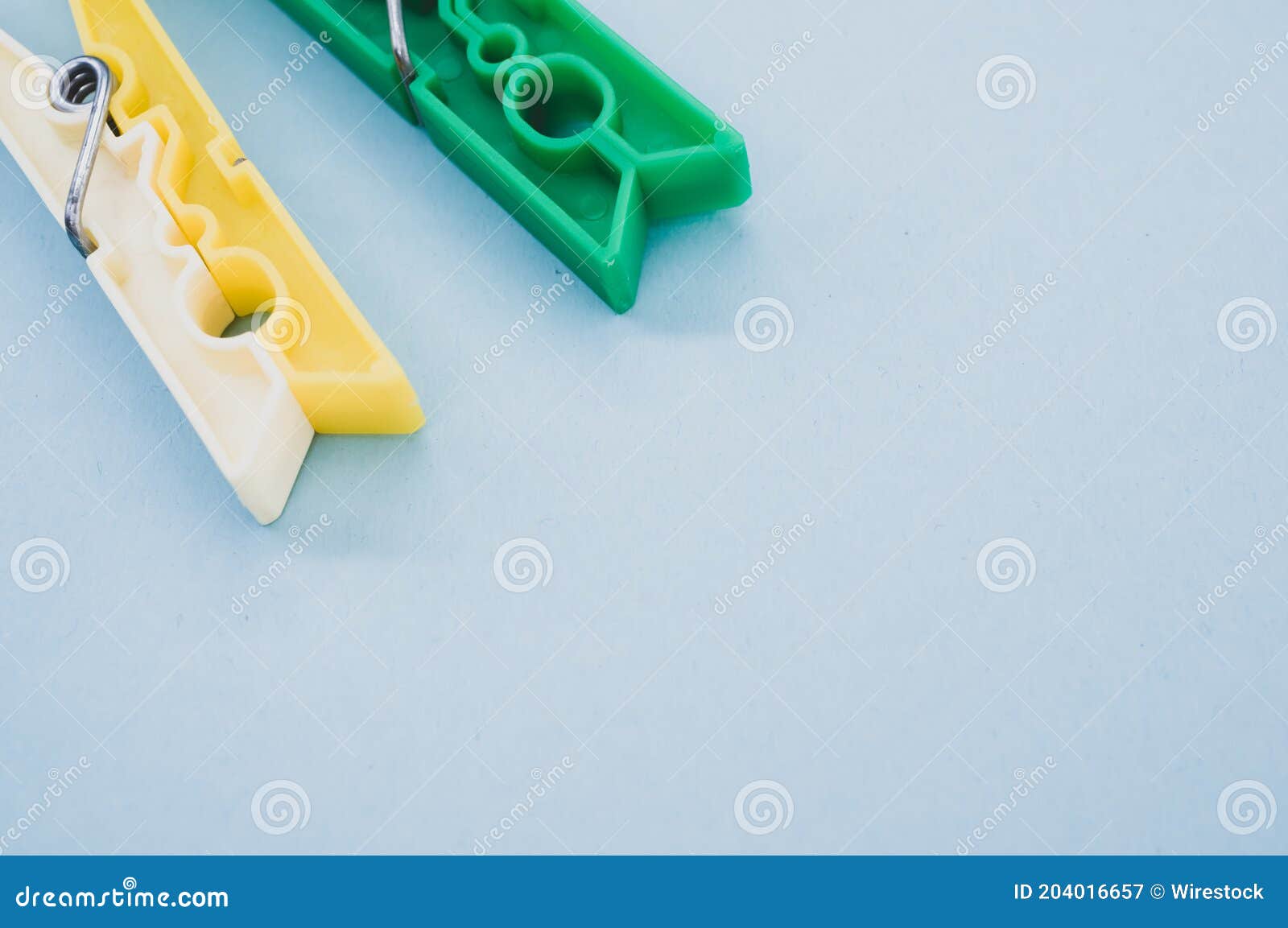 Top View of Plastic Clothespins Isolated on Light Blue Background Stock ...