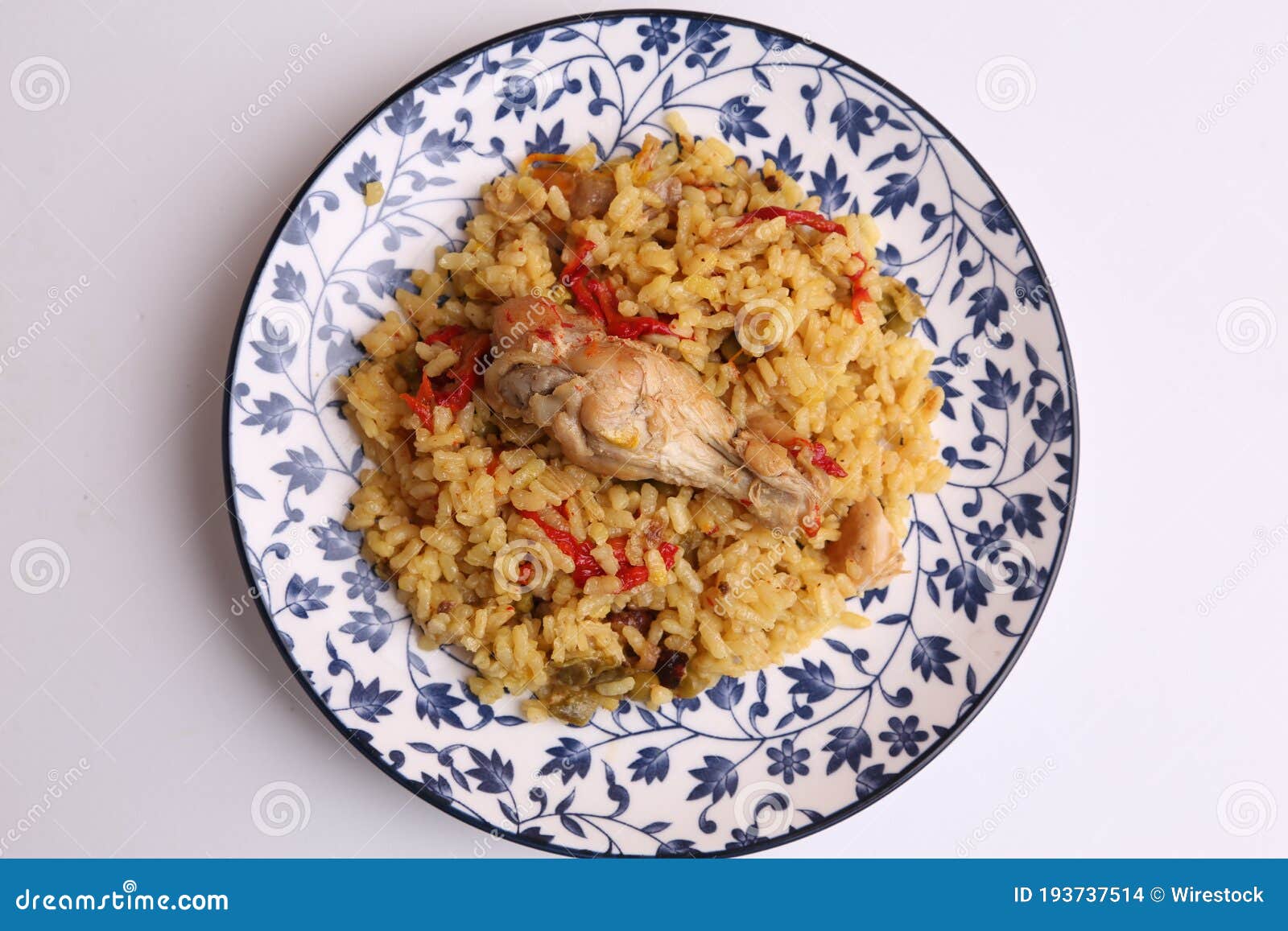 Top View of a Plate of Cooked Rice with Vegetables and Chicken on a ...
