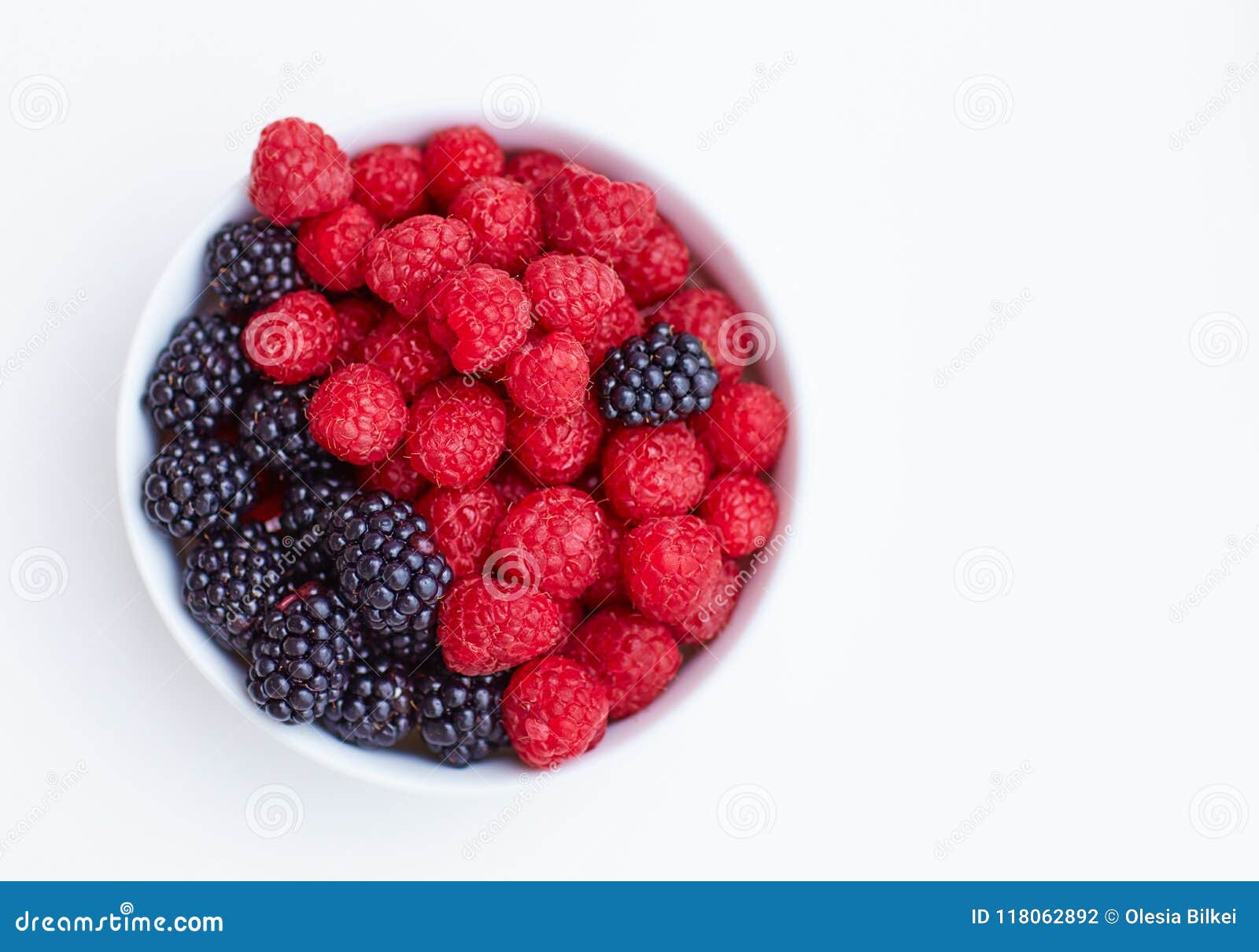 Top View on Plate with Fresh and Ripe Raspberries and Blackberries on ...