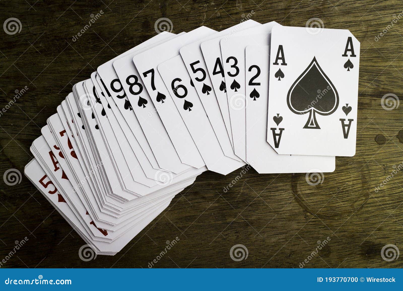Top View of Playing Cards on a Wooden Surface Stock Photo - Image of ...