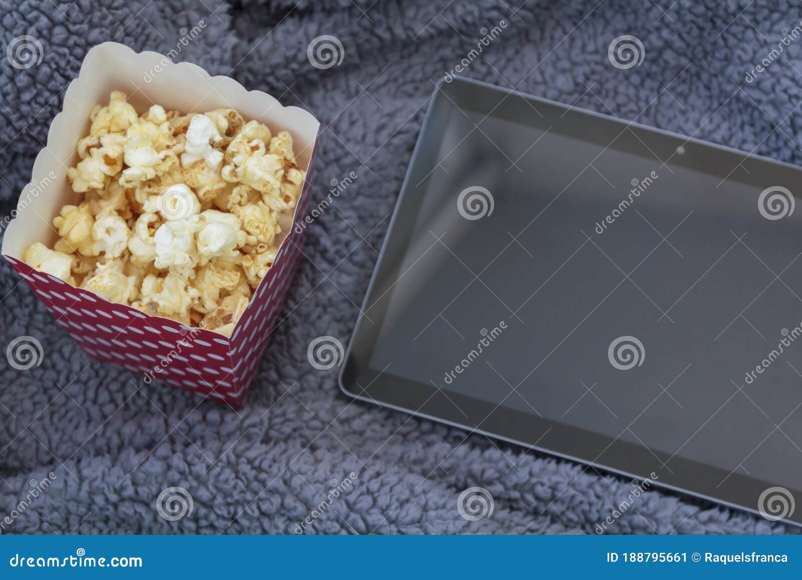 Top View of Popcorn Box, Tablet and Warm Blanket Stock Image - Image of ...