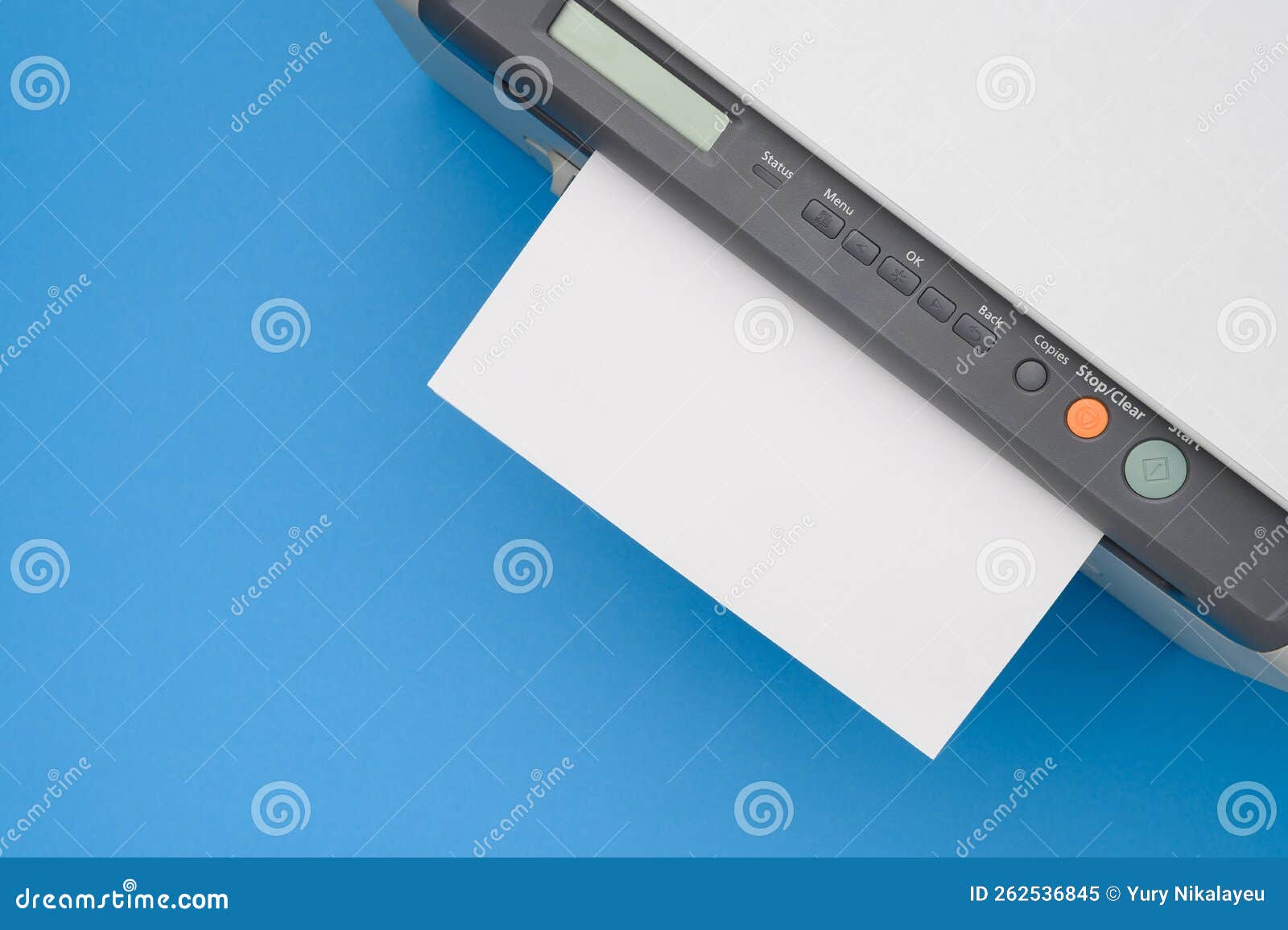 Top View of Printer and Blank A4 Paper on Blue Background.Multifunction ...