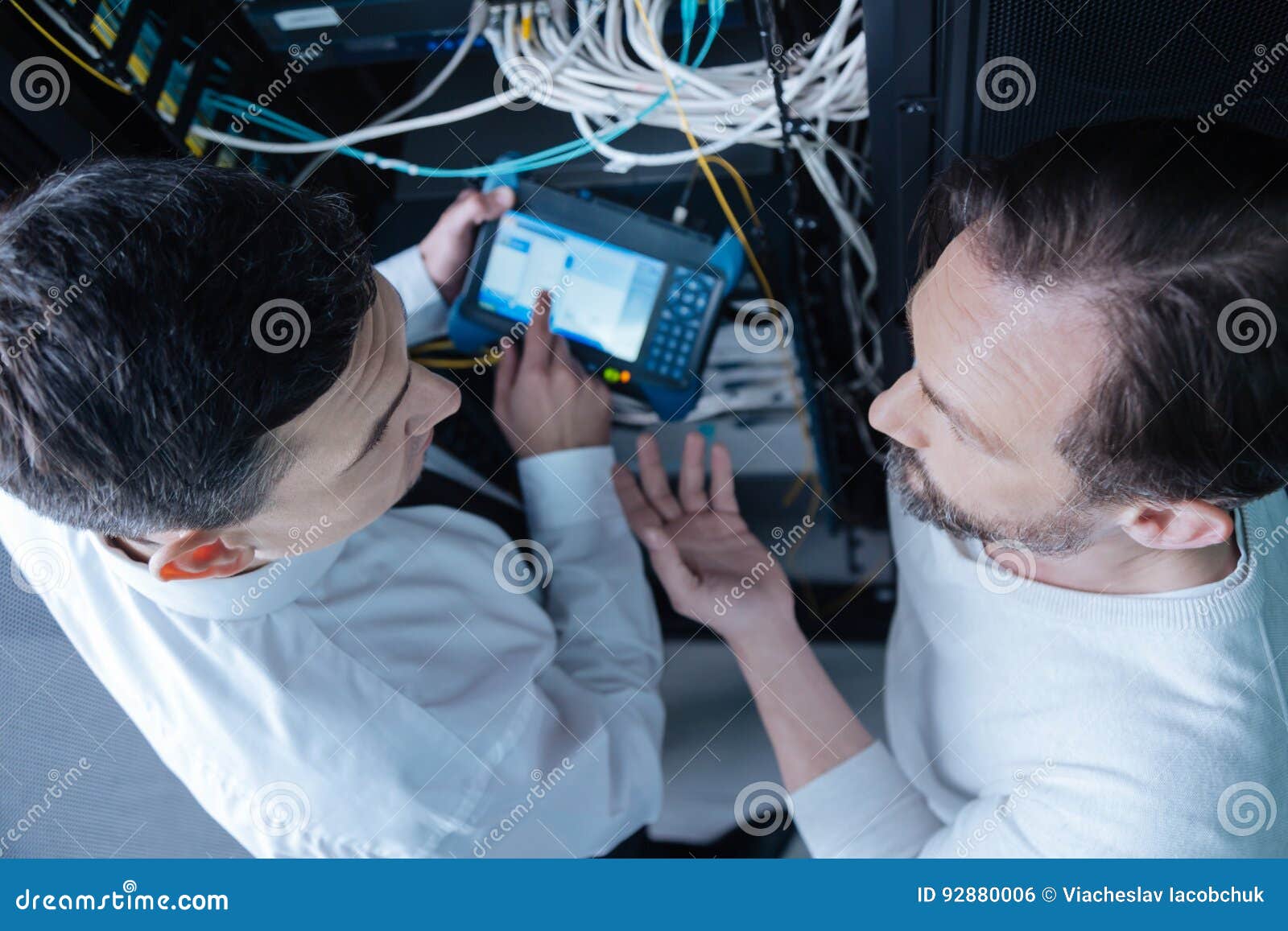 Top View of Professional Technicians Having a Conversation Stock Photo ...