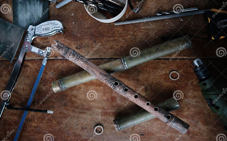 Top View of Flute Made in Bamboo on Workbench with Tools Around it ...