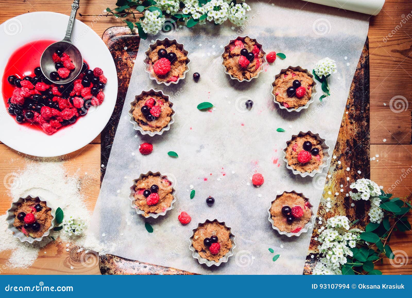 Top View Raw Dough with Berries for Cupcakes Decomposed into Forms on a ...