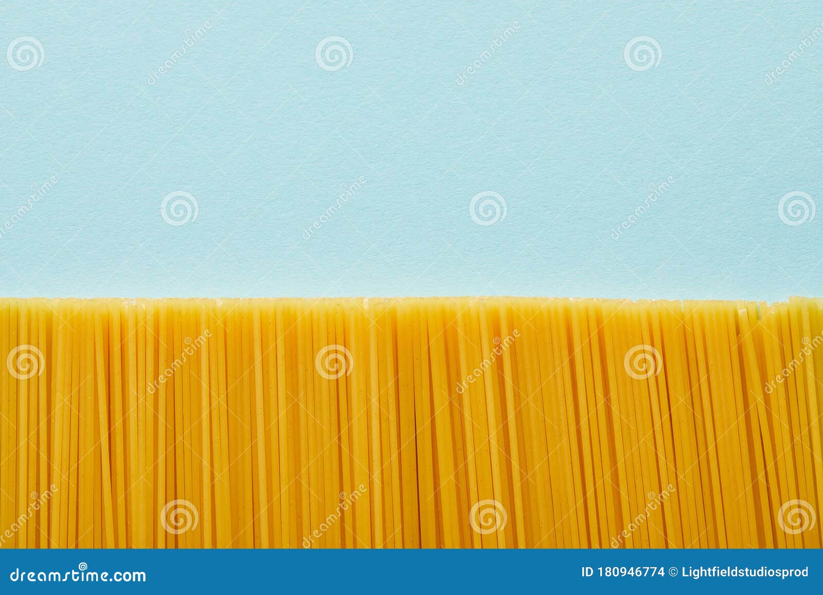 View of Raw Spaghetti on Blue Stock Photo - Image of background ...