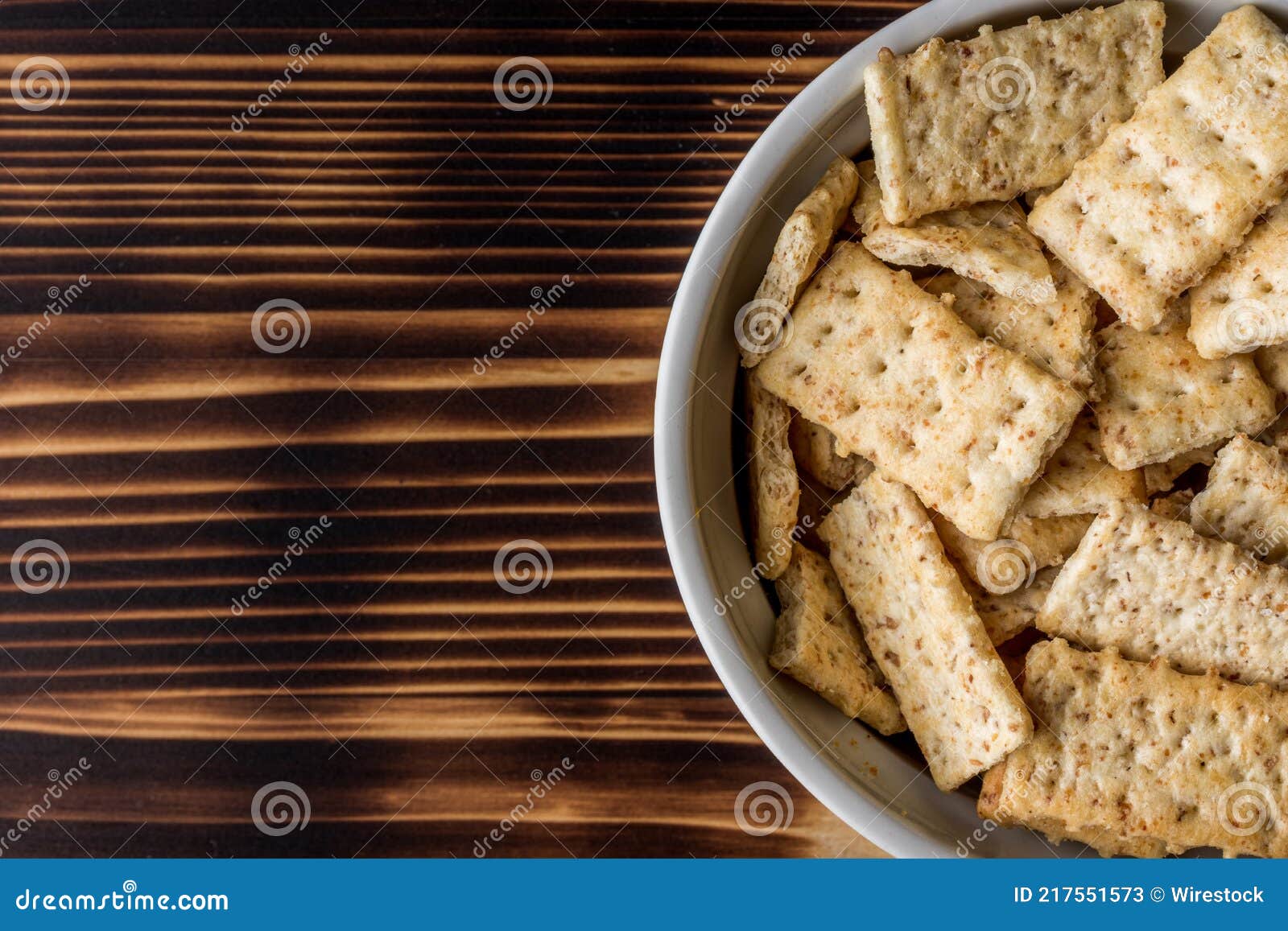 Top View of Rectangular Crackers in the Bowl on the Wooden Table with ...