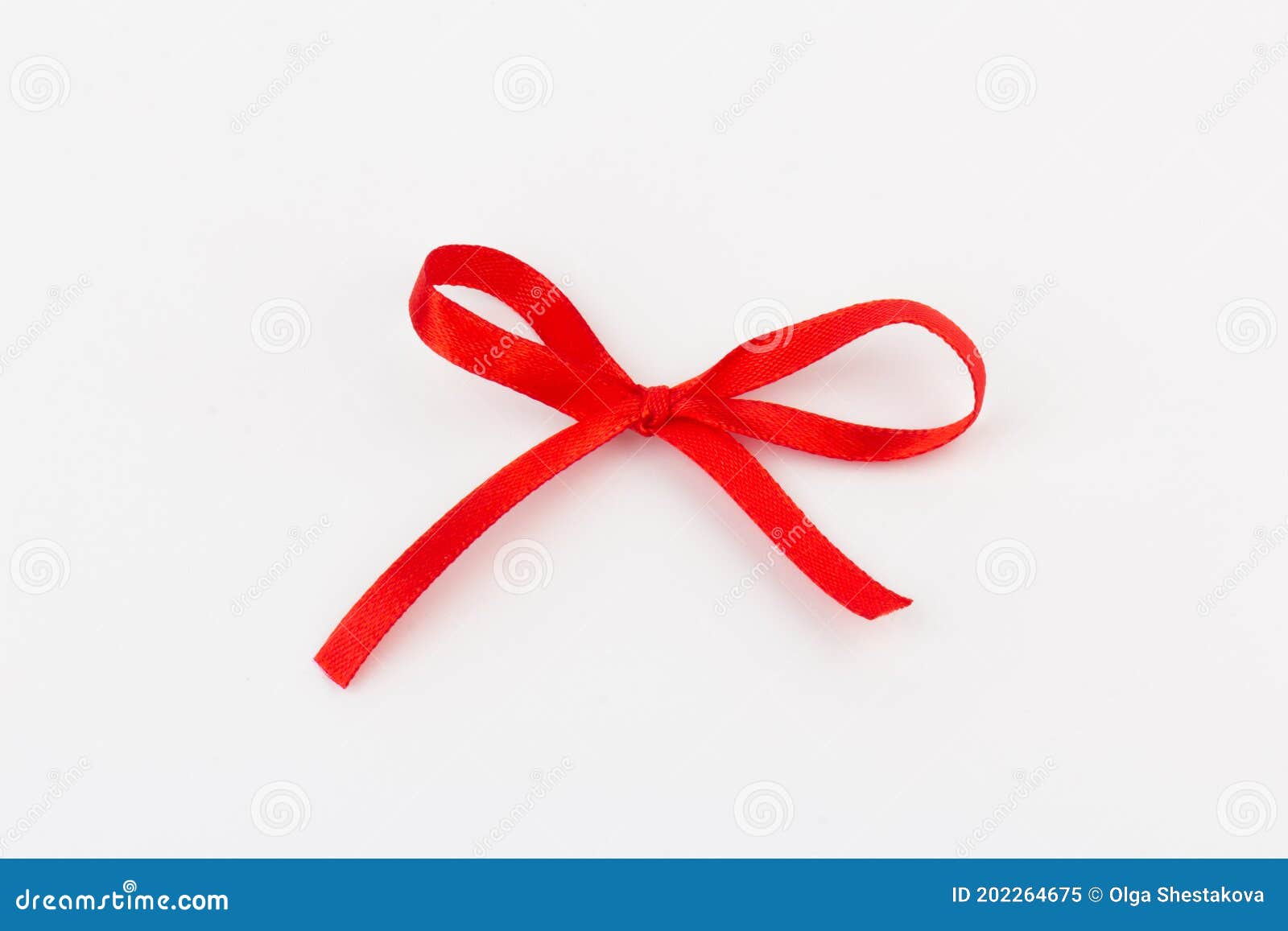 Top View of Red Bow Isolated Shiny Rolled on White Background. Flat Lay ...