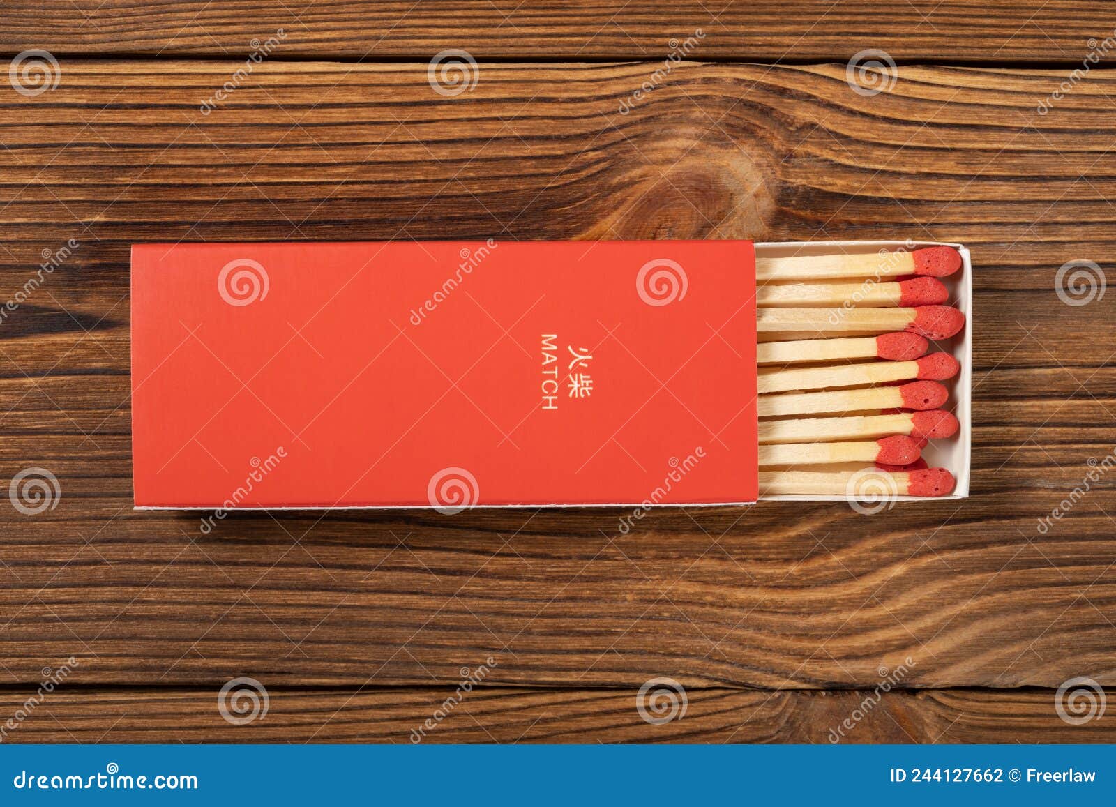 Red Color Matchbox with Red Match Sticks on a Wood Table Stock Photo ...