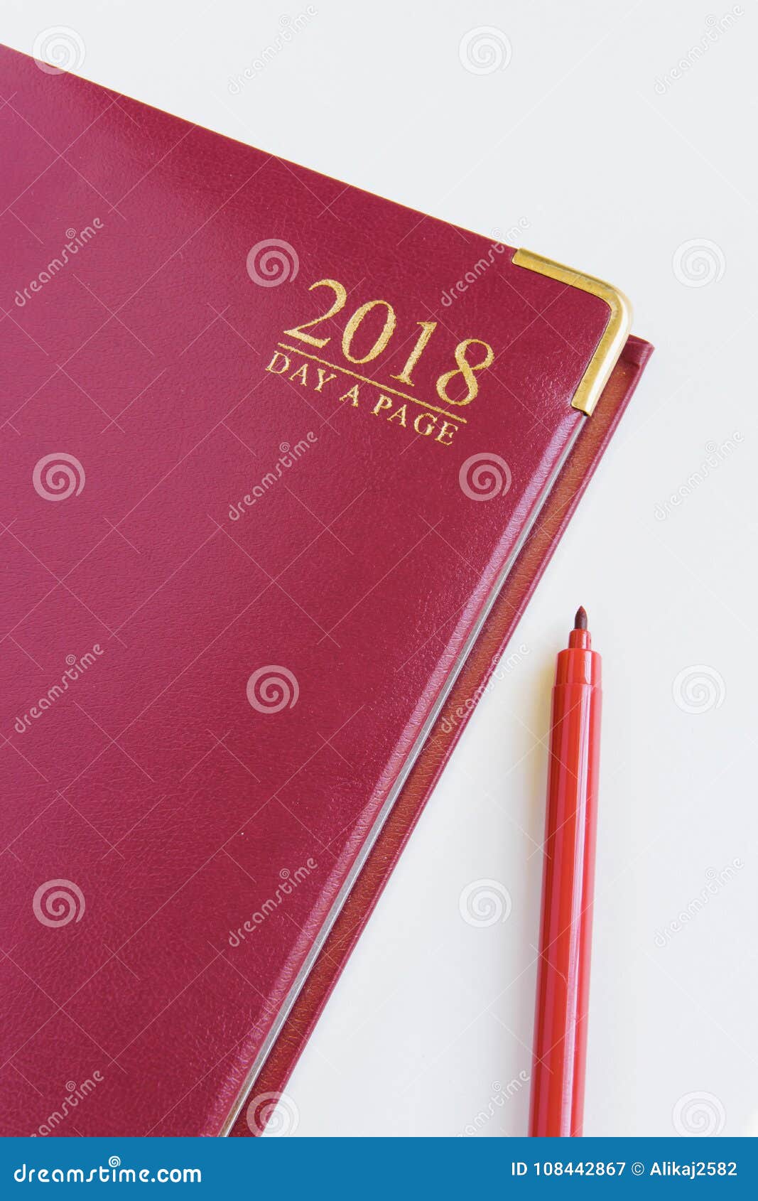 Top View of Red Diary for 2018 with Pen on White Background and Space ...