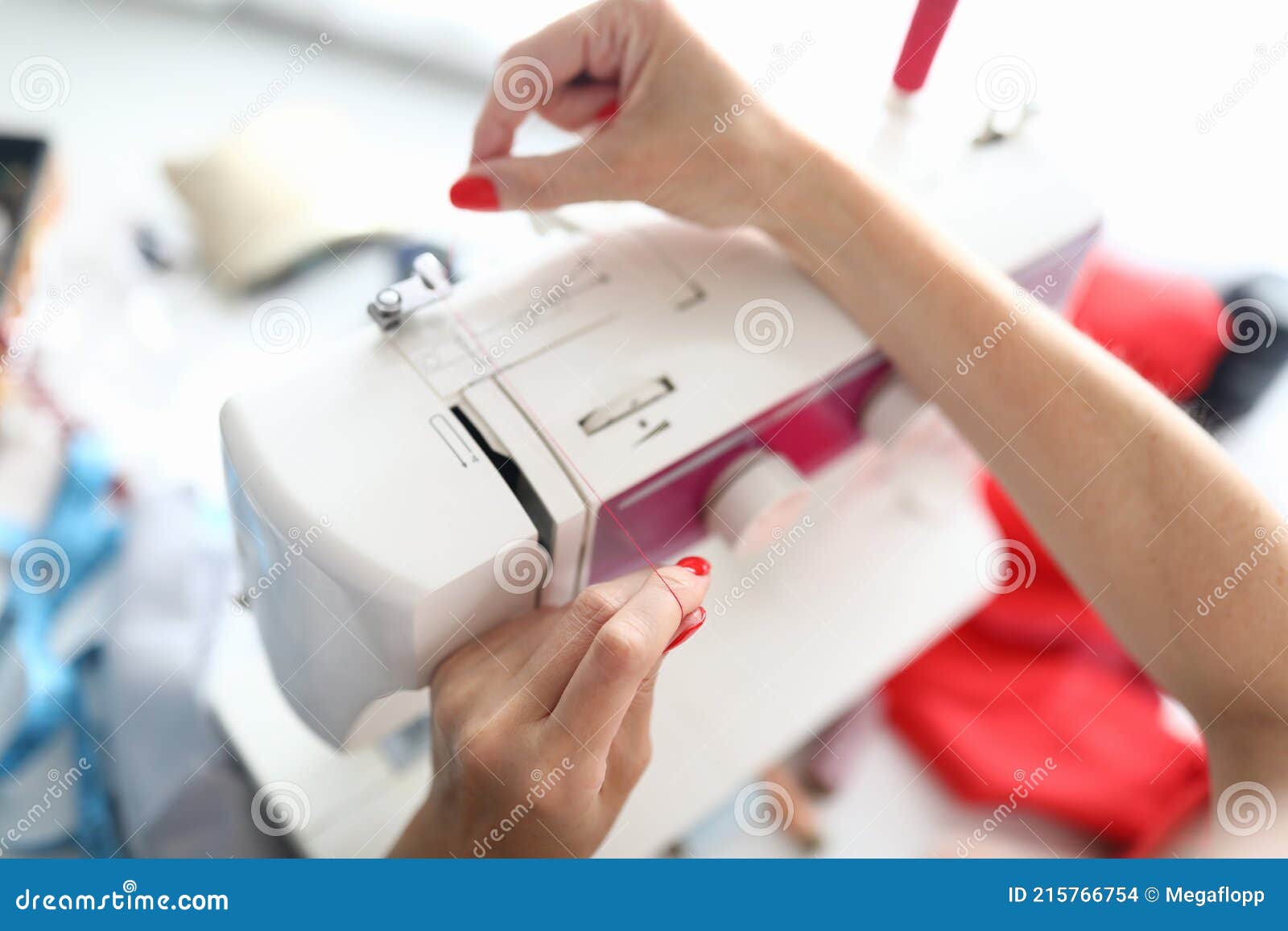 Top View of Red Thread on White Sewing Machine. Professional Device for ...