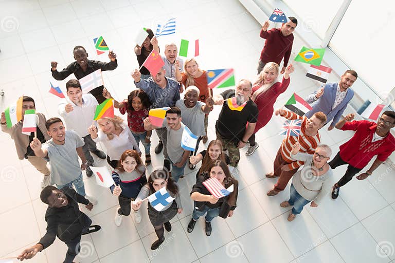 Representatives from Different Countries with Their National Flags ...