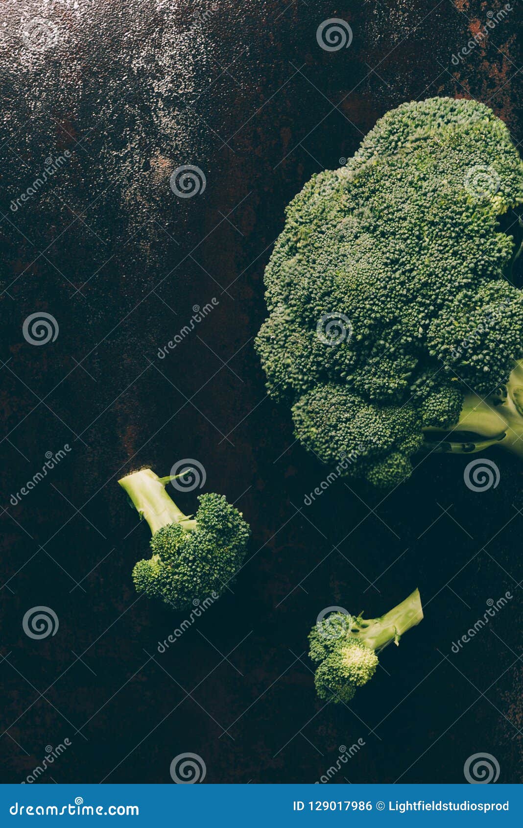 Top View of Ripe Broccoli on Grey Stock Photo - Image of elevatedview ...