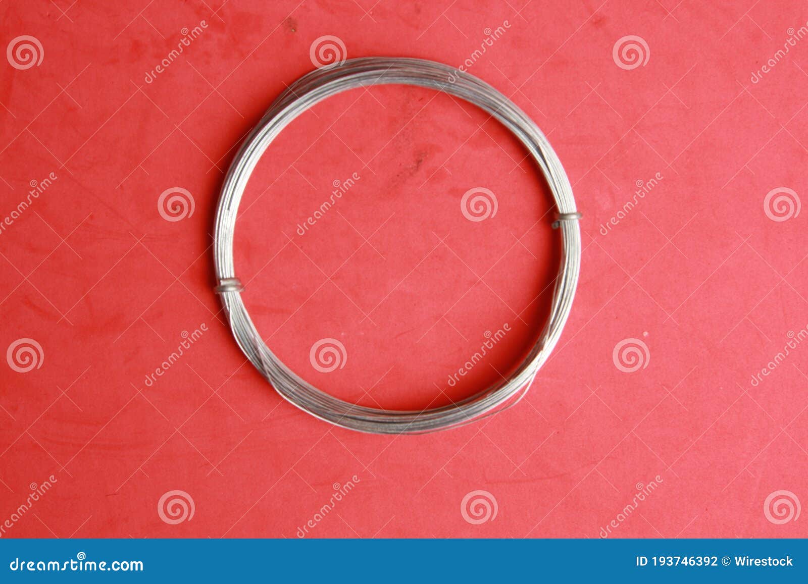 Top View of the Rolls of Metal Wire Isolated on a Red Background Stock ...