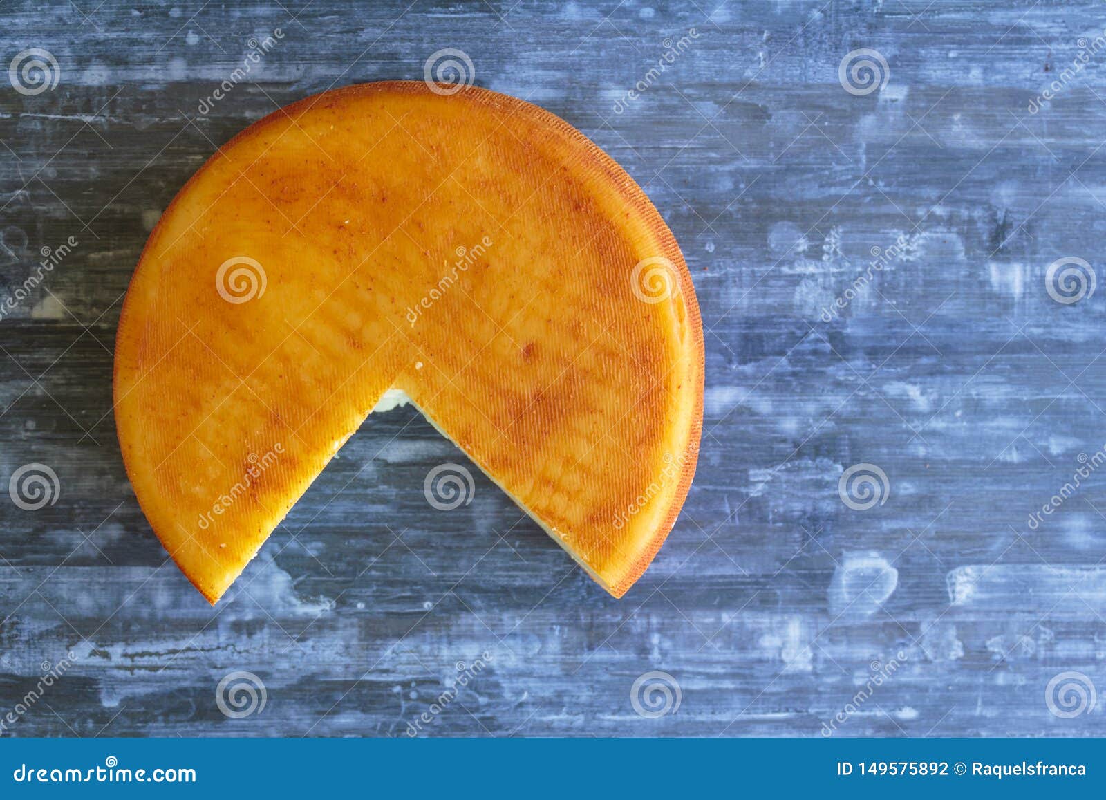 Top View of Round Cheese Missing a Piece Stock Photo - Image of ...