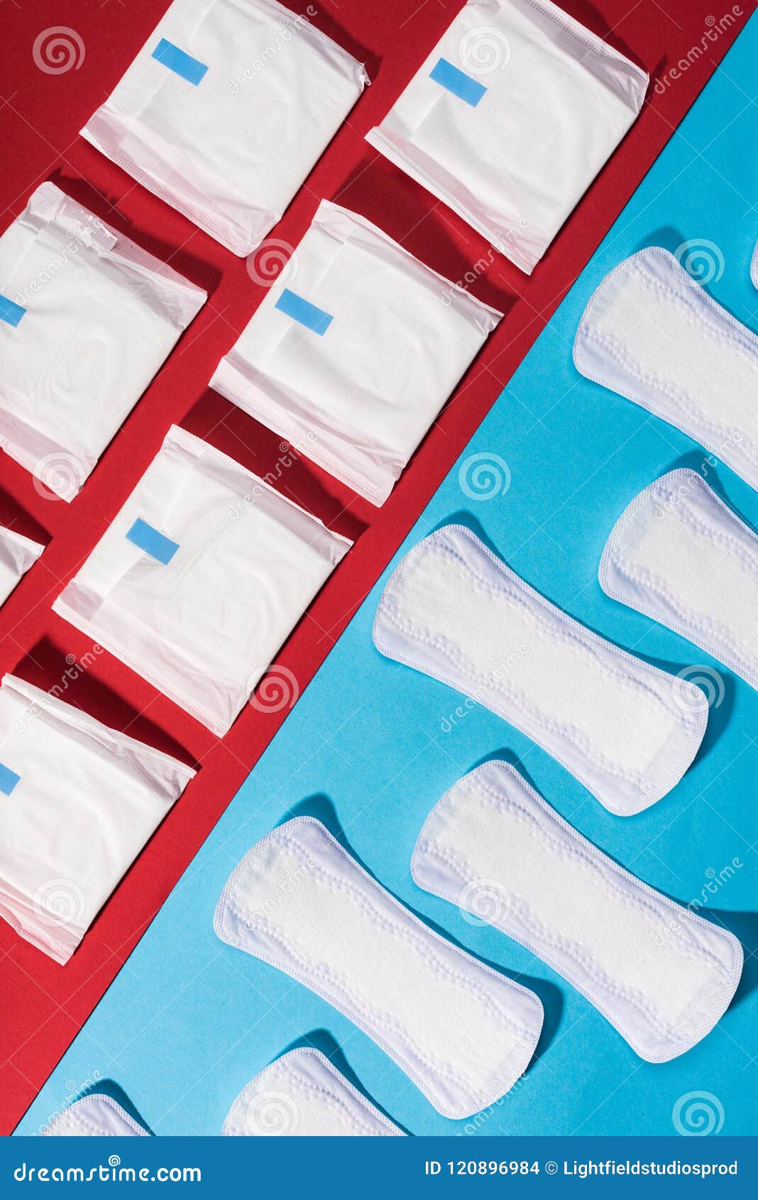 Top View of Rows of Pads and daily Liners on Red Stock Photo - Image of ...