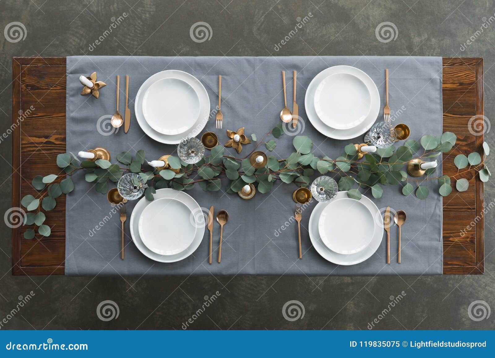 Top View of Rustic Table Setting with Eucalyptus, Tarnished Cutlery ...