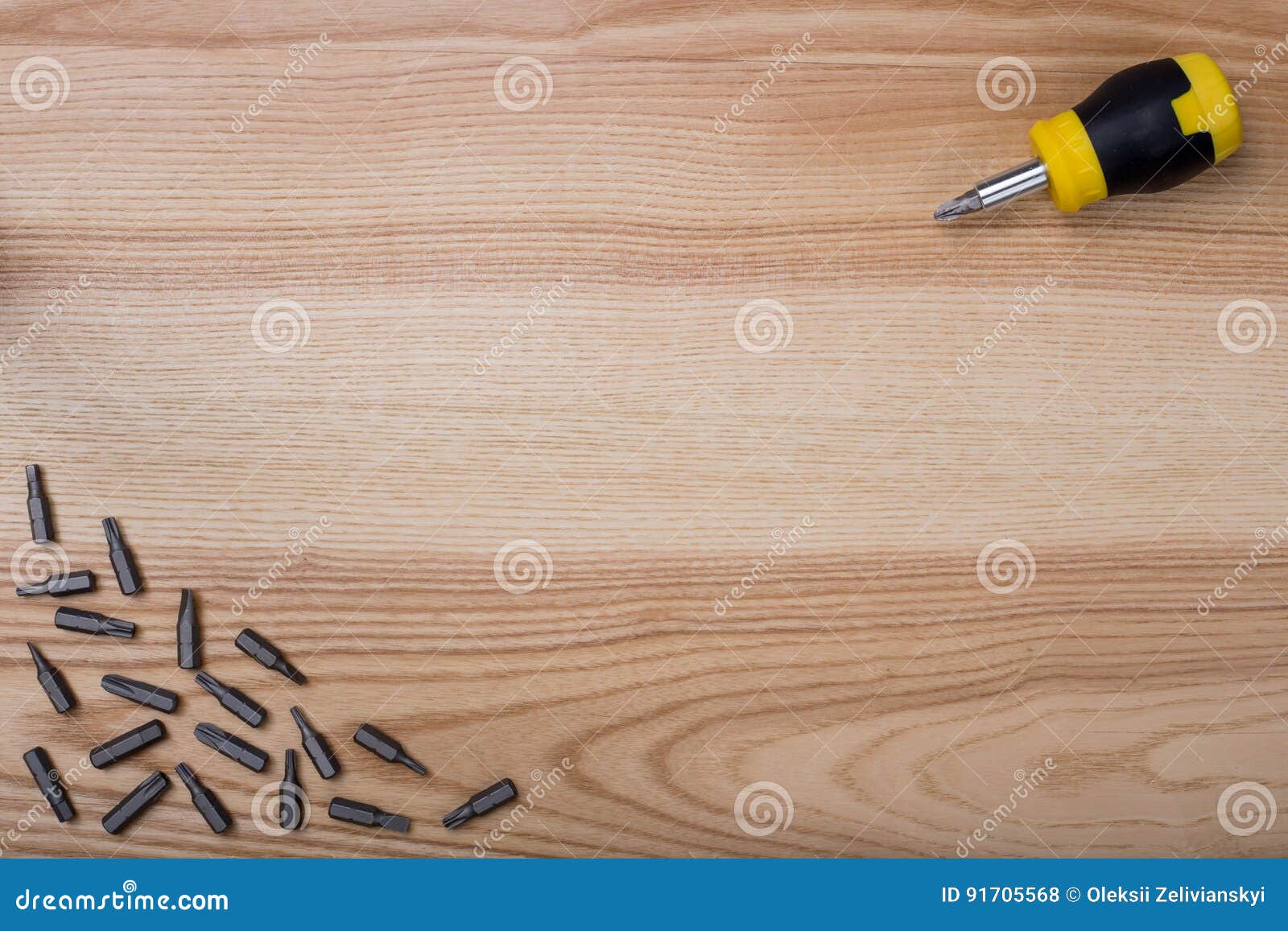 Top View Screwdriver with Set of Bits on Wooden Table Stock Photo ...