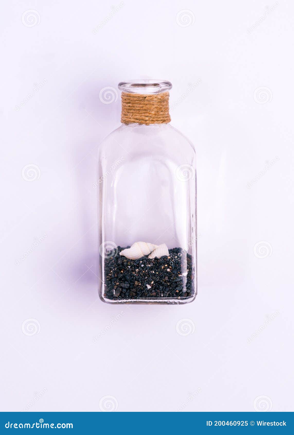 Top View of the Seashells and the Sand in the Glass Jar on the White ...