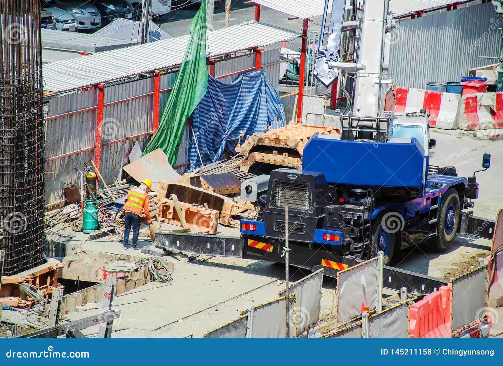 Top View See the Construction Site of Workers Working and Trucks that ...