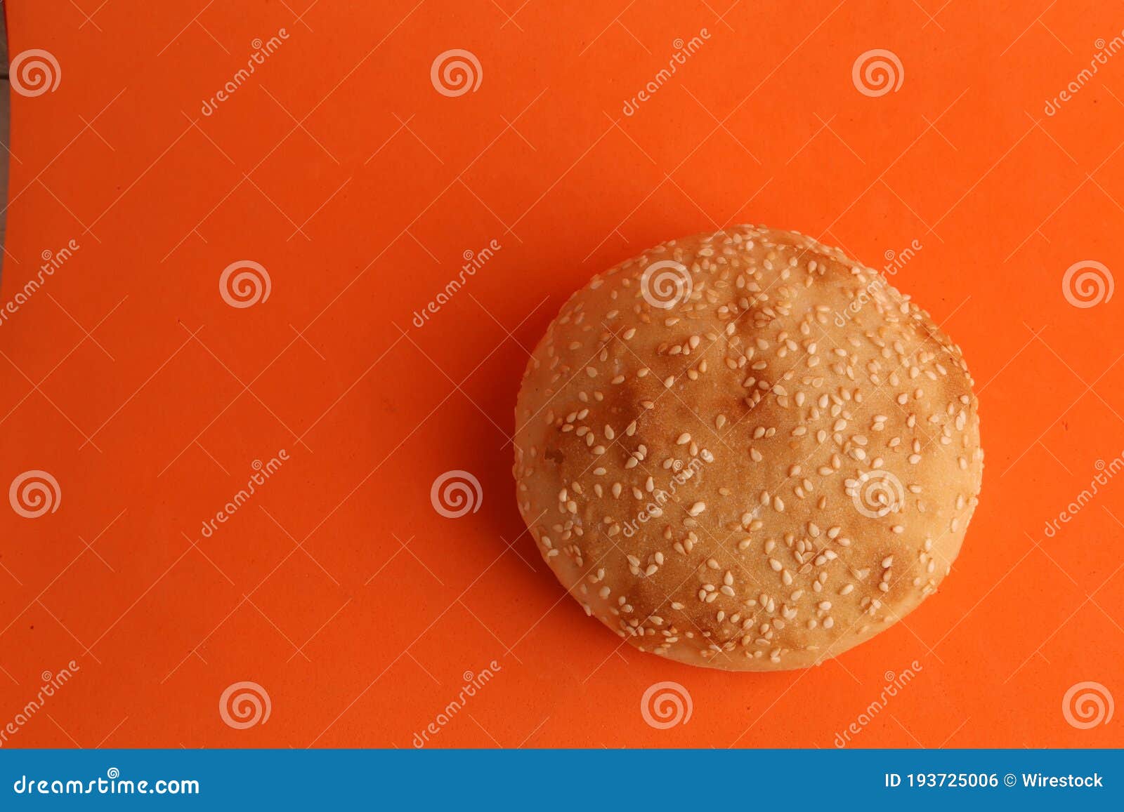 Top View of a Sesame Bun Isolated on an Orange Background Stock Photo ...