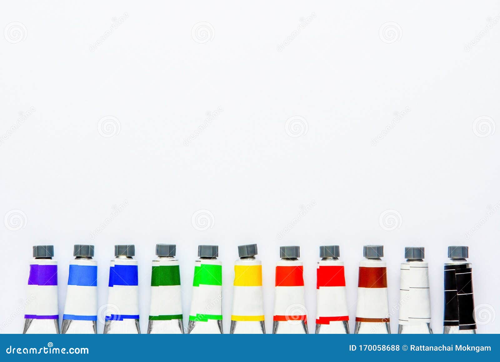 Top View Set of Colored Tubes on White Drawing Pad Background, Copy ...