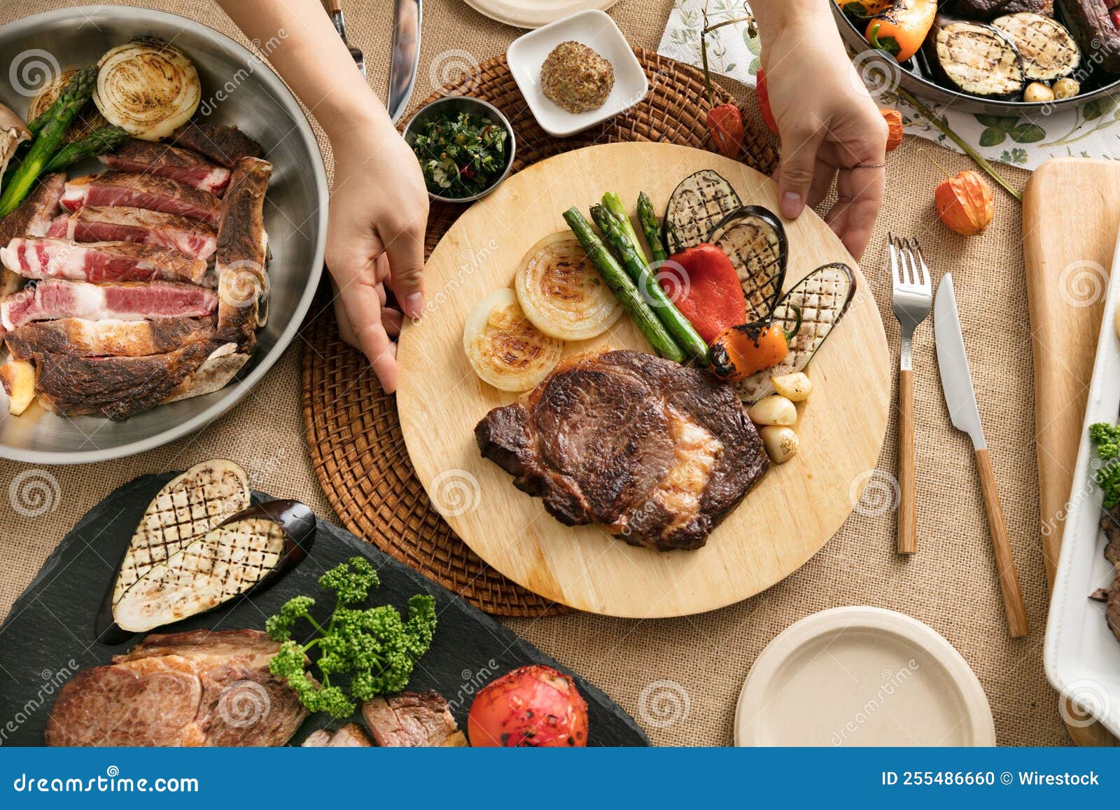 Top View of a Set Table with Steaks and Grilled Vegetables - Restaurant ...