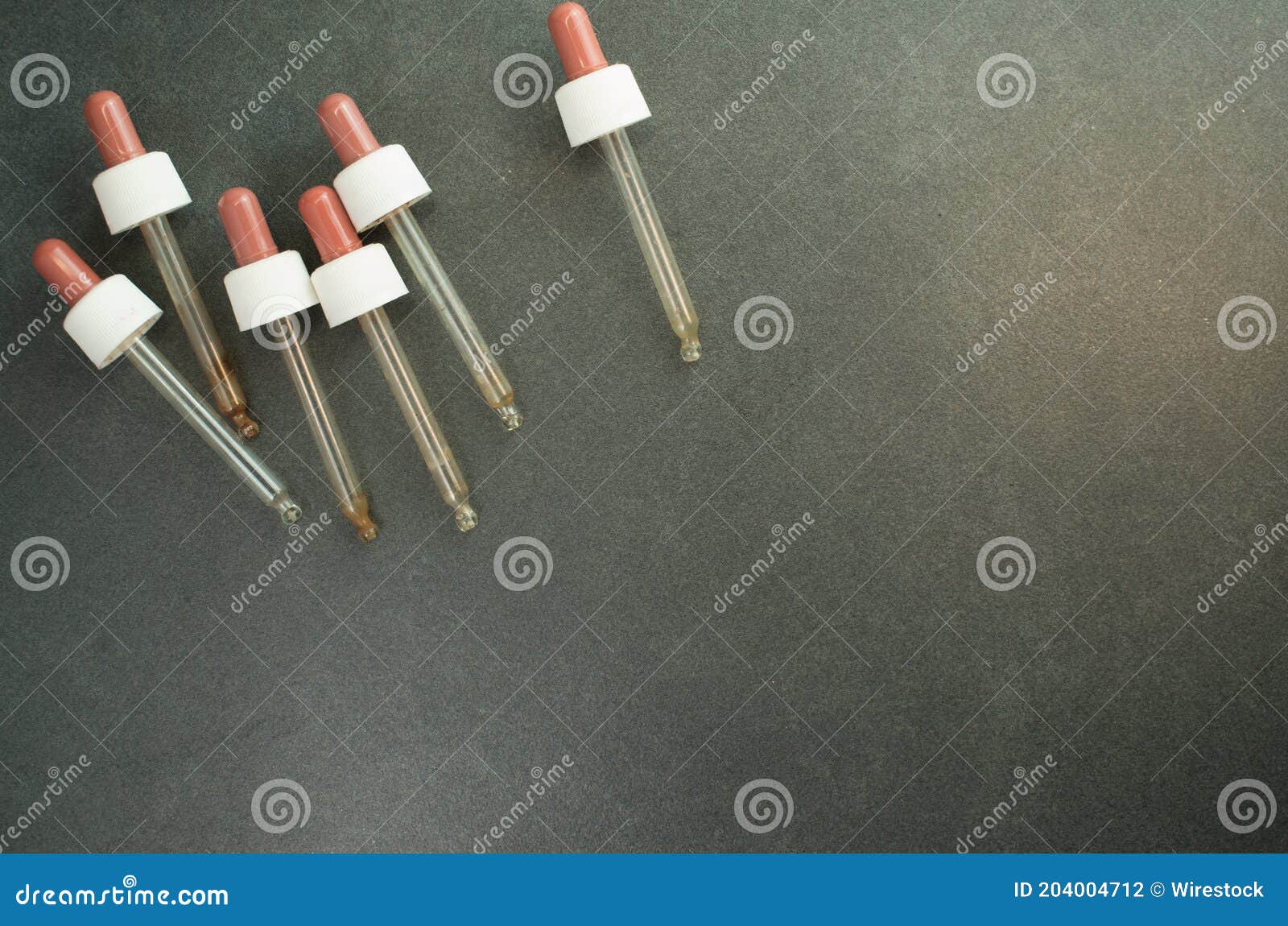 Top View of Several Pipettes on a Dark Surface Stock Photo - Image of ...