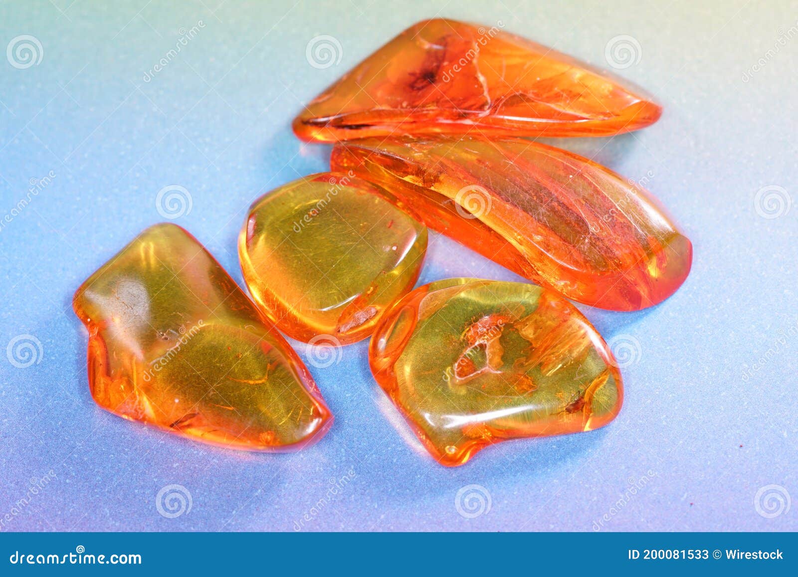 Top View Shot of a Beautiful Amber on Blue Background Stock Image ...