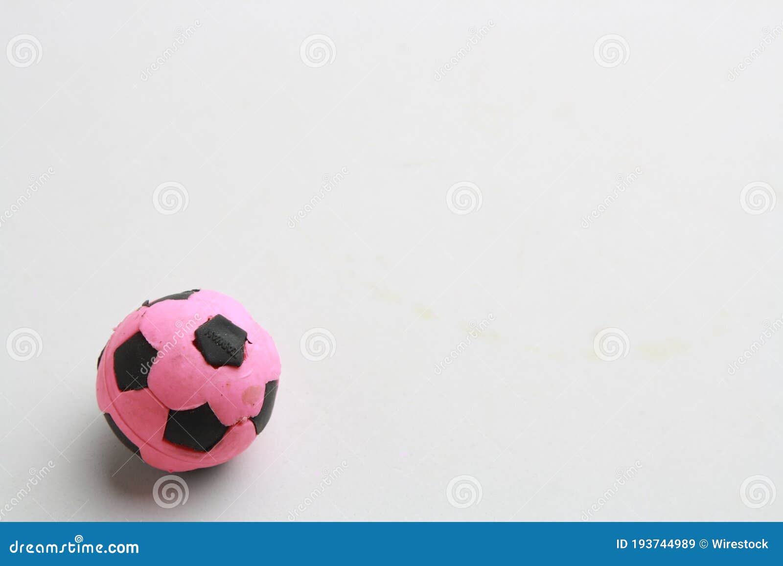 Top View of a Small Black and Pink Ball Isolated on a White Background ...