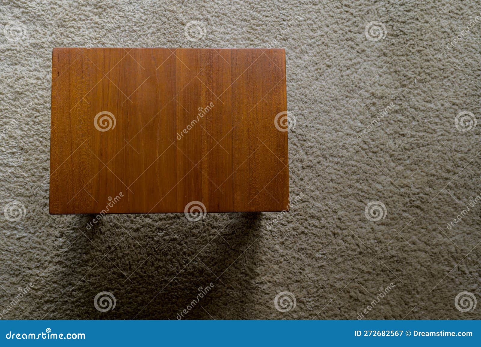 Top View of Small Teak Table on Beige Carpet. Stock Image - Image of ...