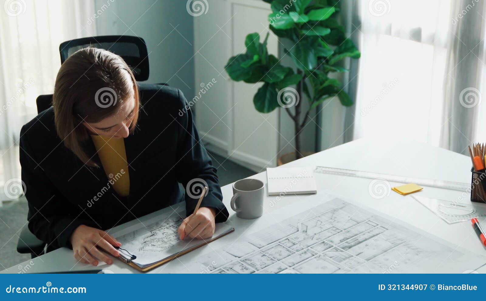 Top View of Smart Civil Engineer Drawing and Measuring Blueprint ...