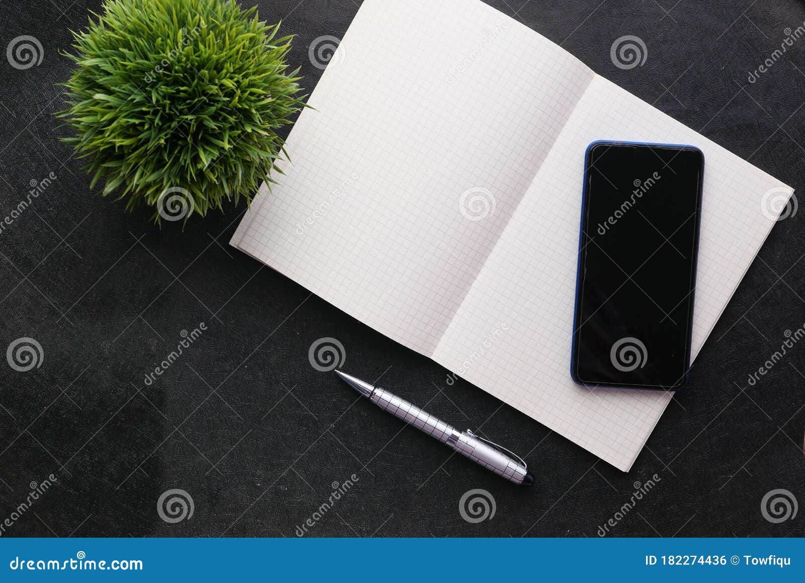 Top View of Smart Phone with Empty Screen and Notepad on Black ...