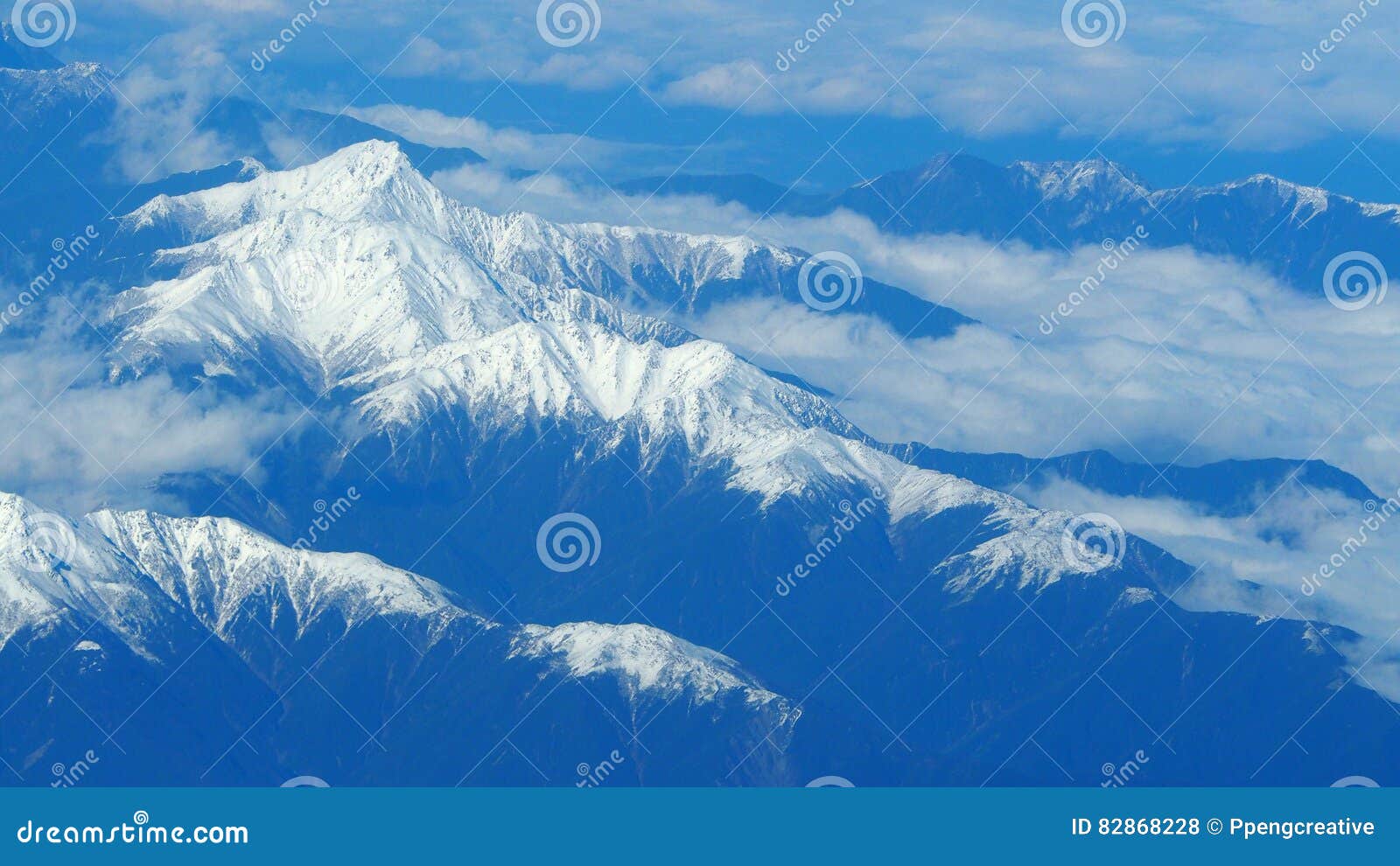 Top view of snow hills. stock photo. Image of cloud, travel - 82868228