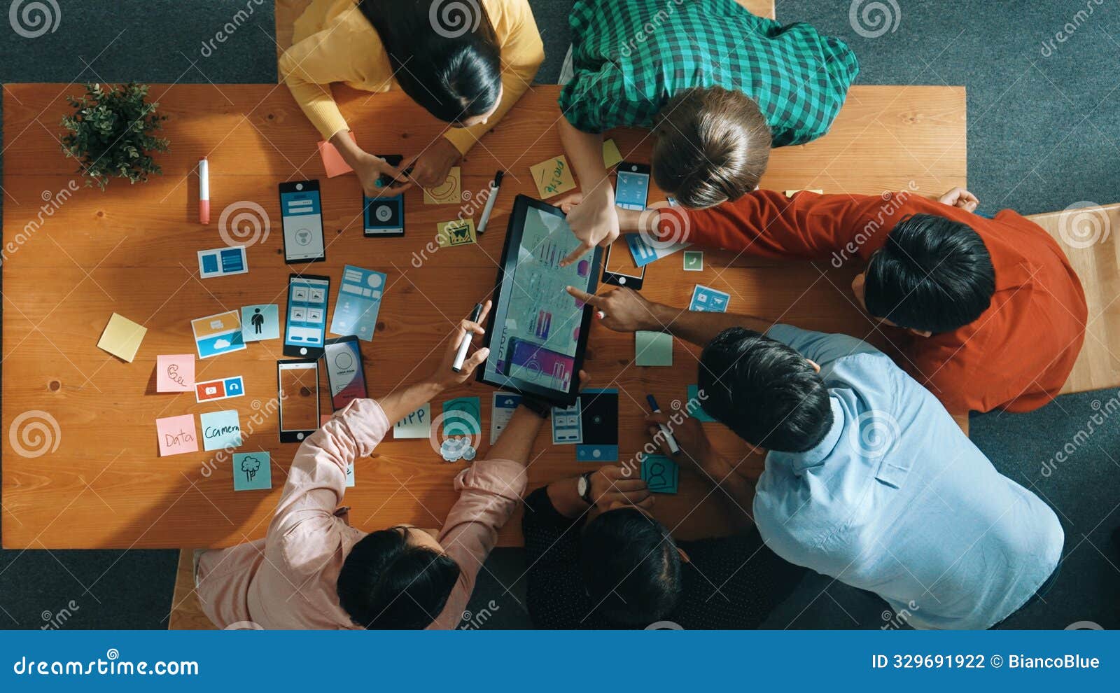 Top View of Software Developer Team Looking Ux Design from Tablet ...