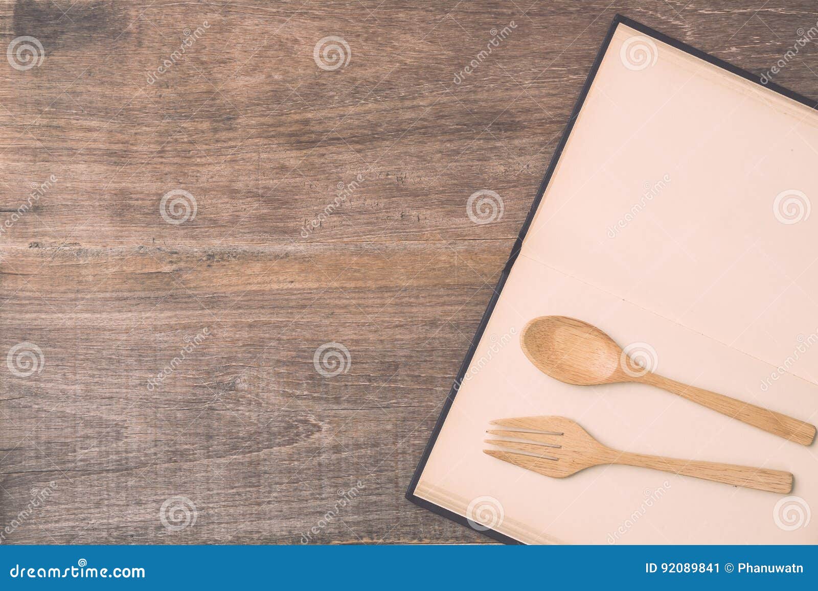 Top View Spoon, Fork and Book on Wooden Plank Background Stock Image ...