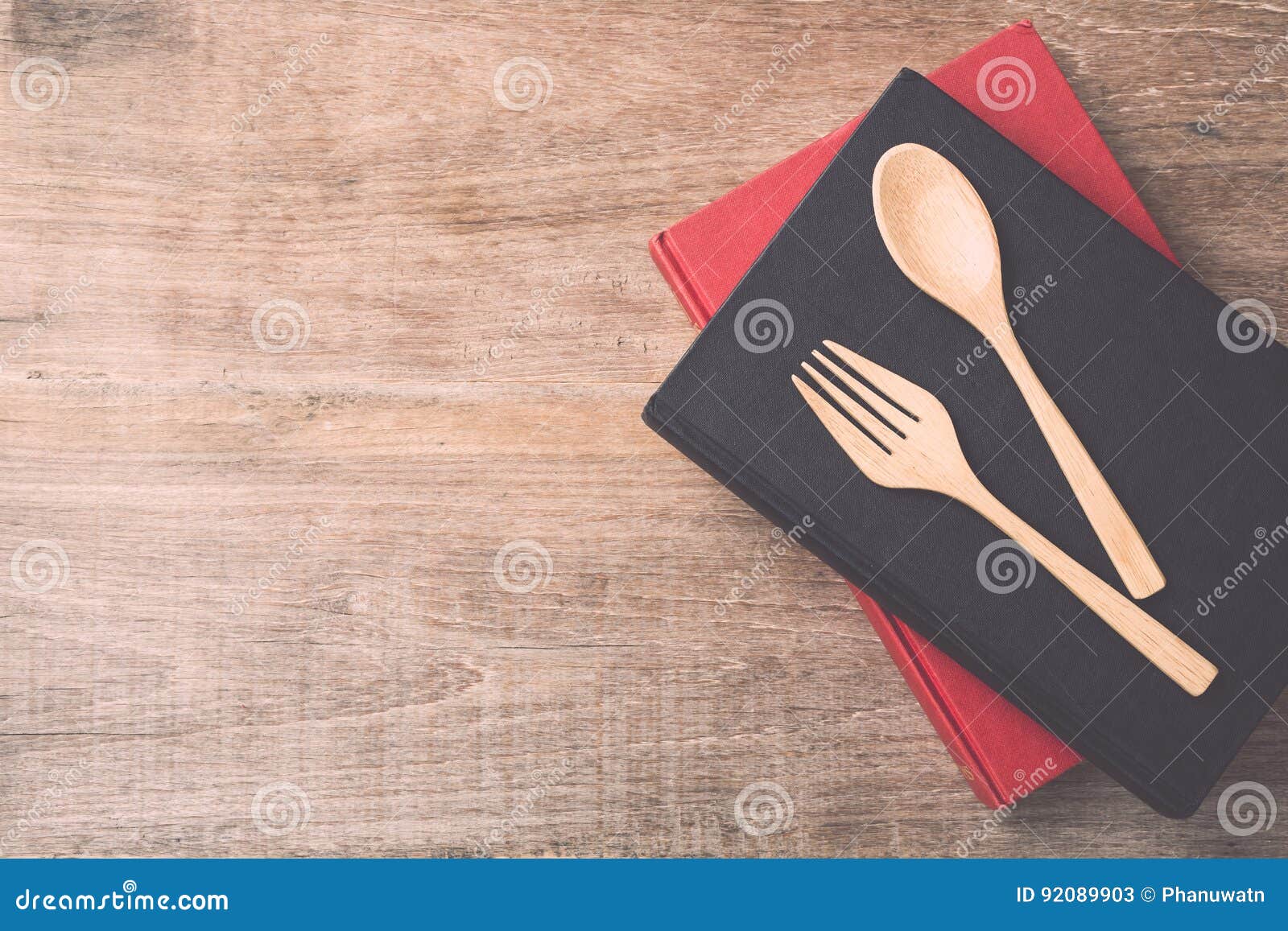 Top View Spoon, Fork and Book on Wooden Plank Background Stock Image ...
