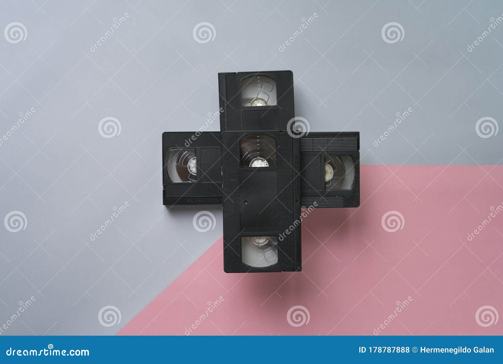 Top View A Stack Of VHS Cassetes On A Pink And Purple Background Stock ...