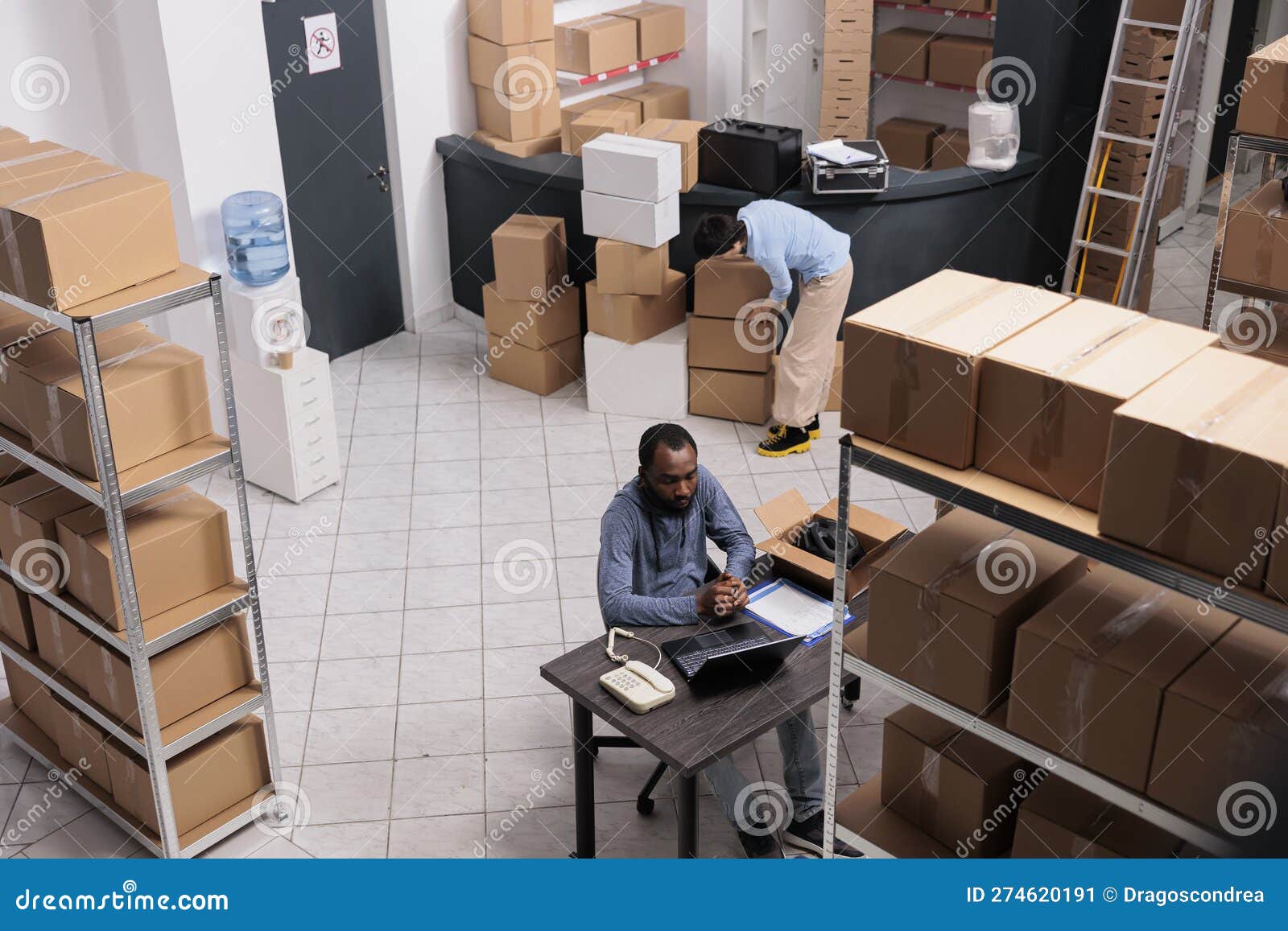 Top View of Storehouse Worker Checking Distribution Logistics on Laptop ...