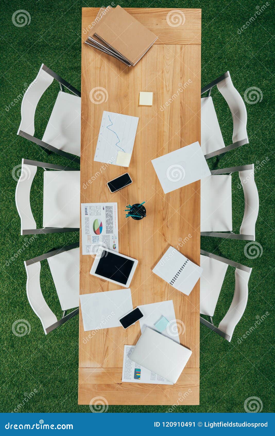 Top View of Table with Digital Tablet, Smartphones and Documents Stock ...
