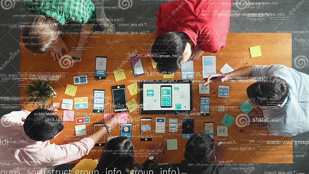 Top View of Team Brainstorm and Looking Tablet with Coding Program ...