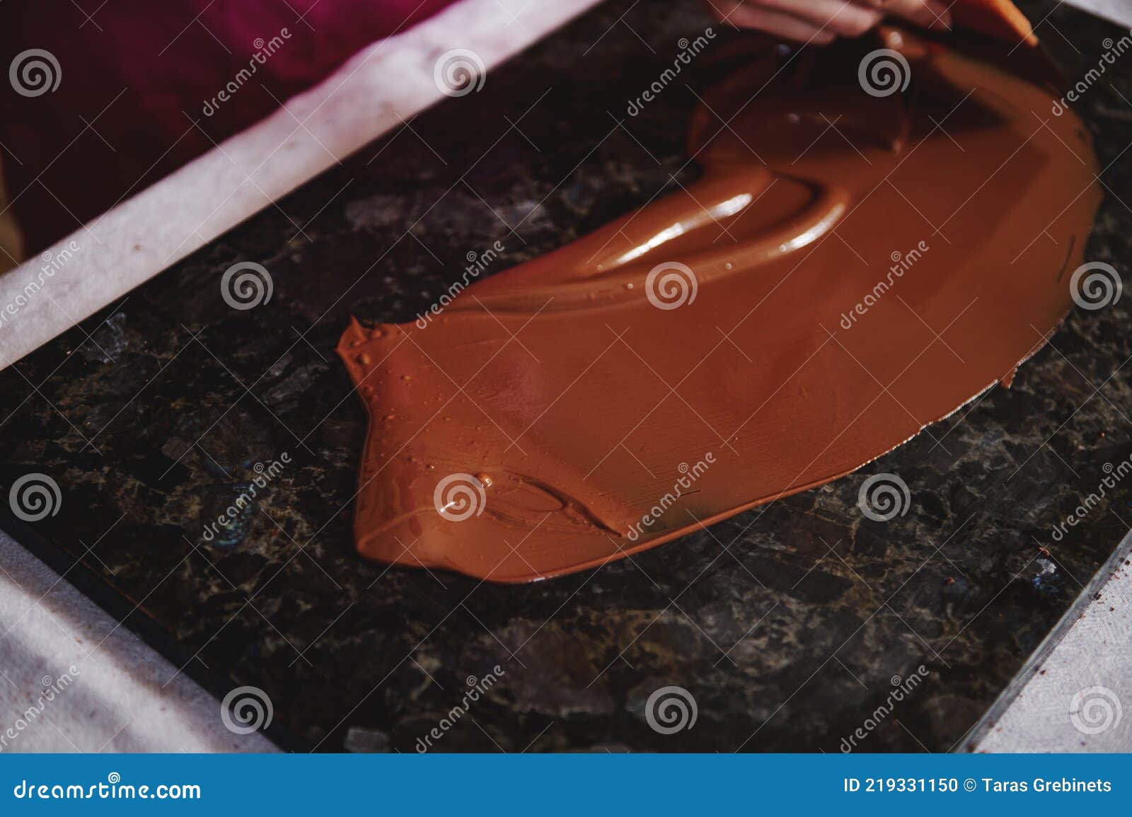 Top View of Tempering Chocolate Mass on a Dark Marble Surface Stock ...