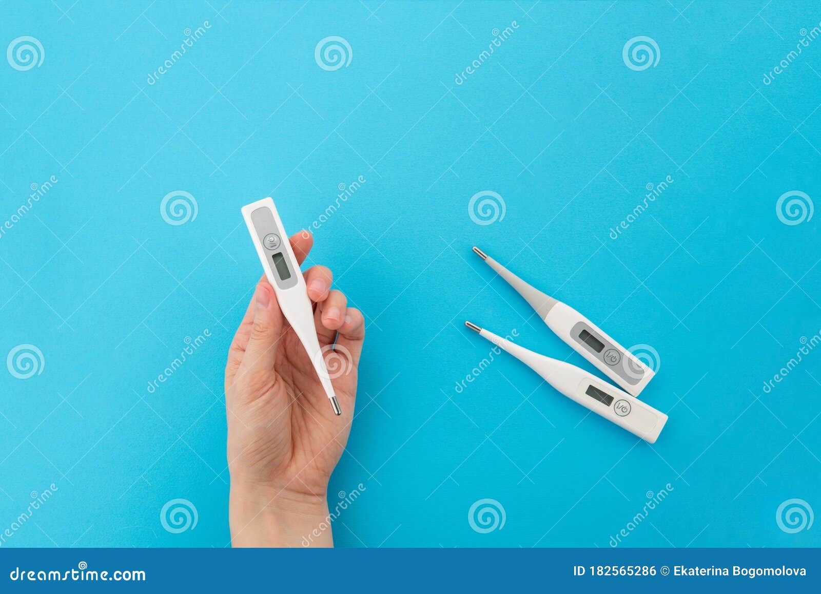 Top View of Three Thermometers in Hand. Electronic Device for Measuring ...