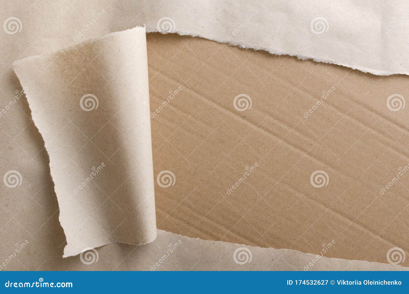 Torn Wrapping Paper Revealing Cardboard Box Royalty-Free Stock Image ...