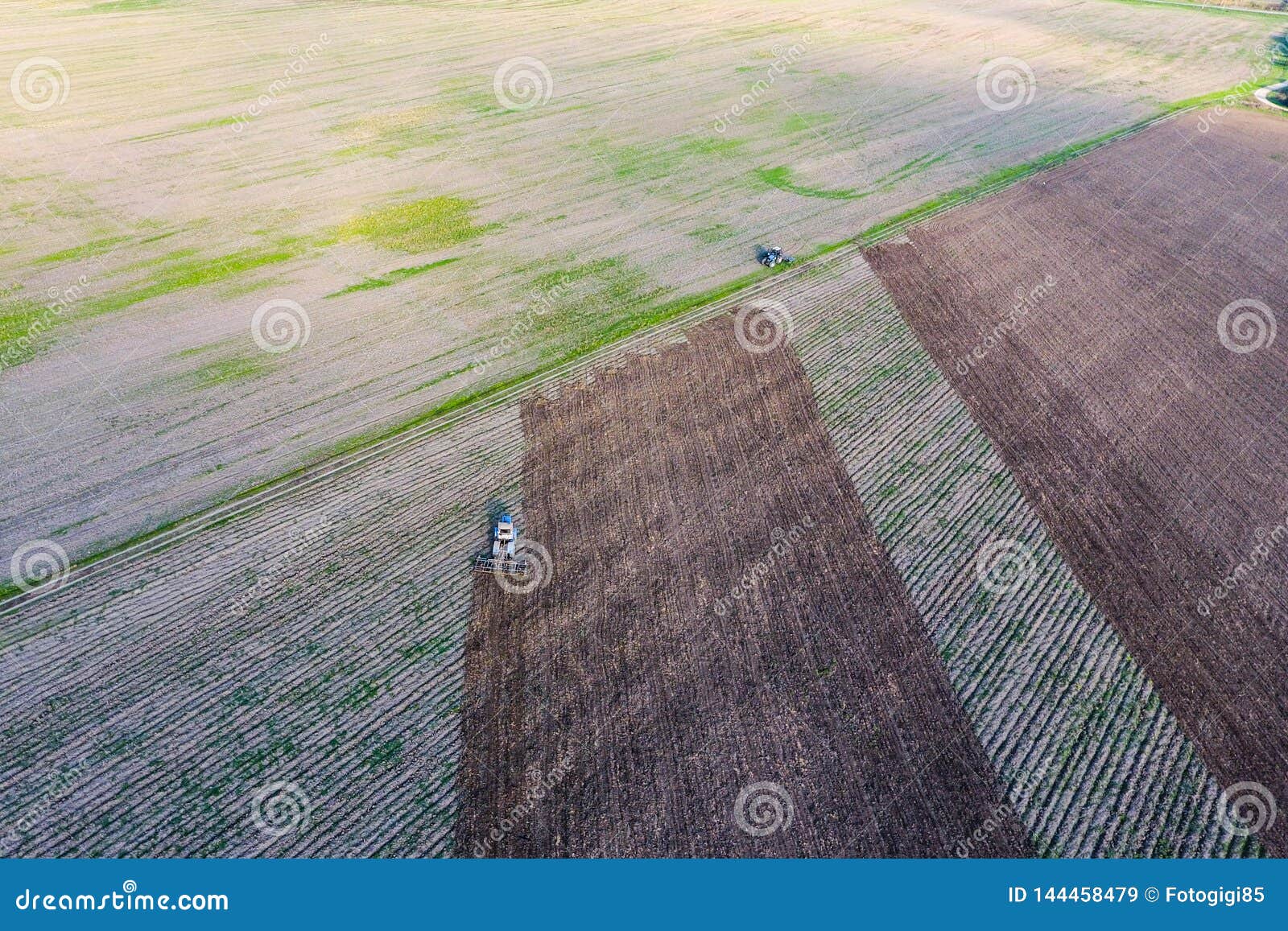 Top View of the Tractor that Plows the Field. Disking the Soil Stock ...