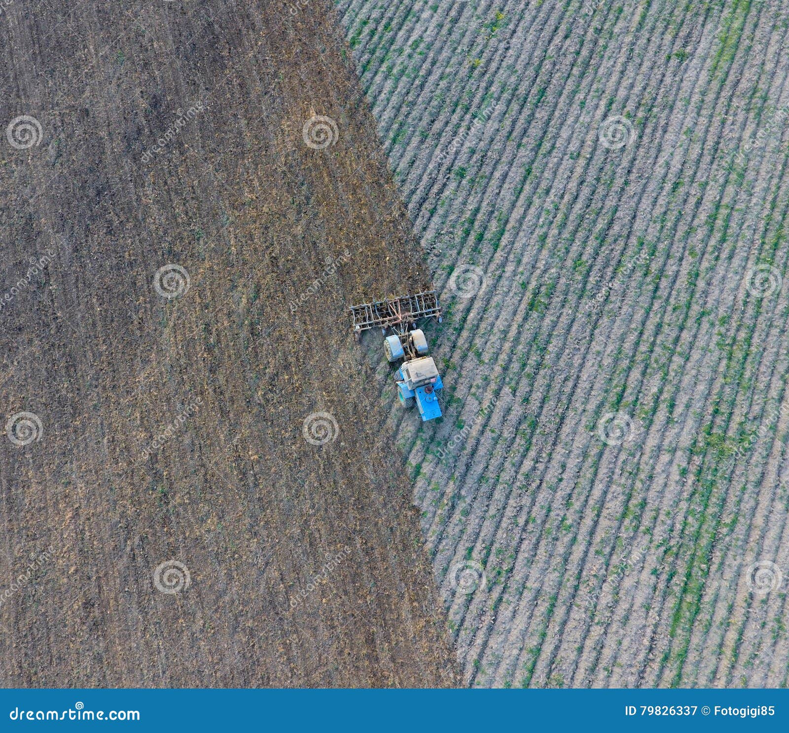 Top View of the Tractor that Plows the Field. Disking the Soil Stock ...
