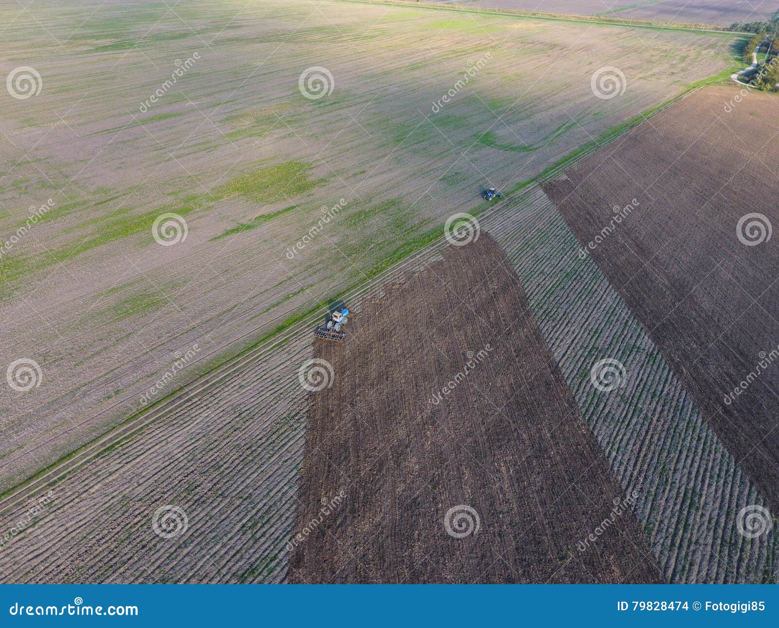 Top View of the Tractor that Plows the Field. Disking the Soil Stock ...