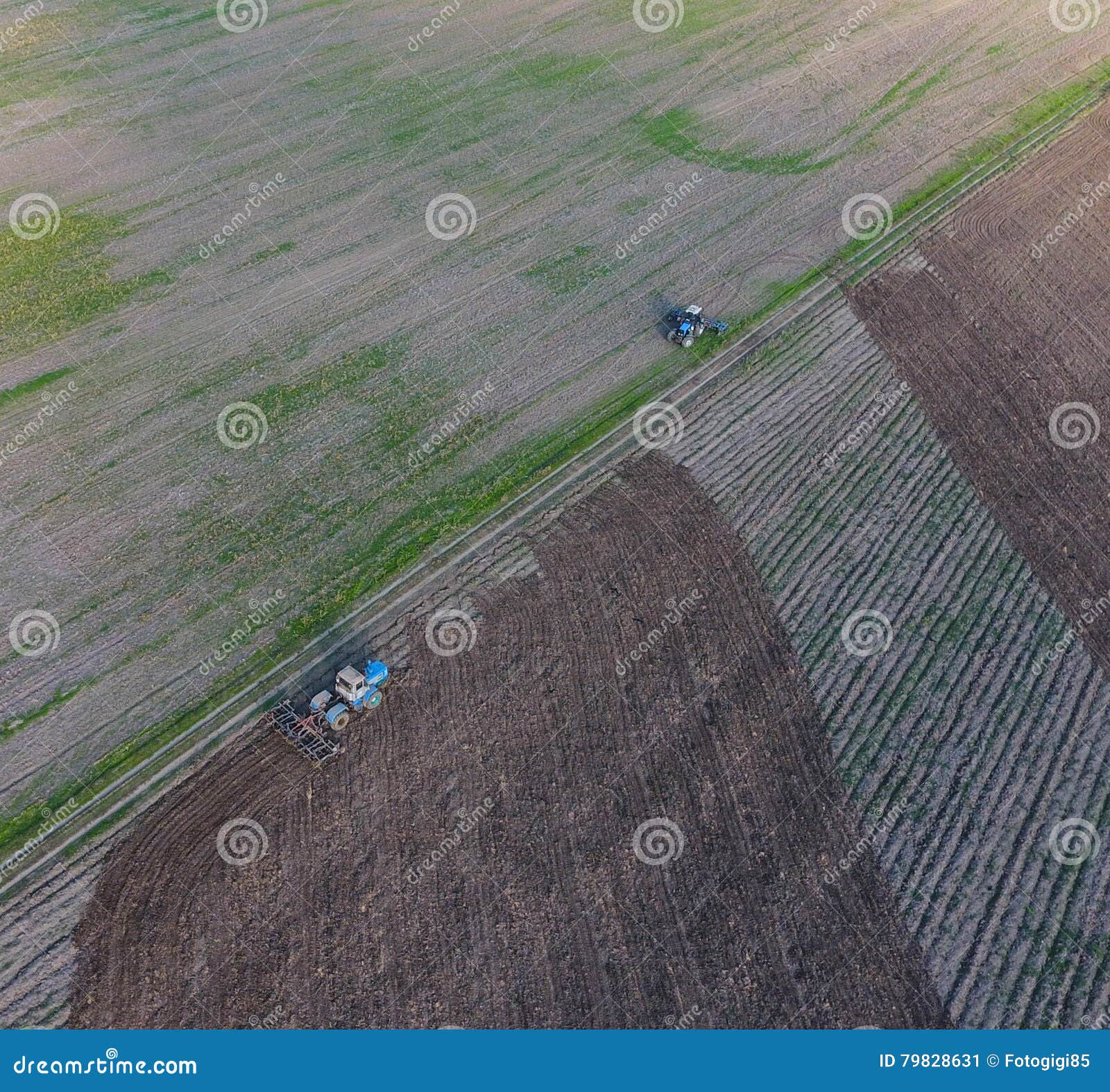 Top View of the Tractor that Plows the Field. Disking the Soil Stock ...