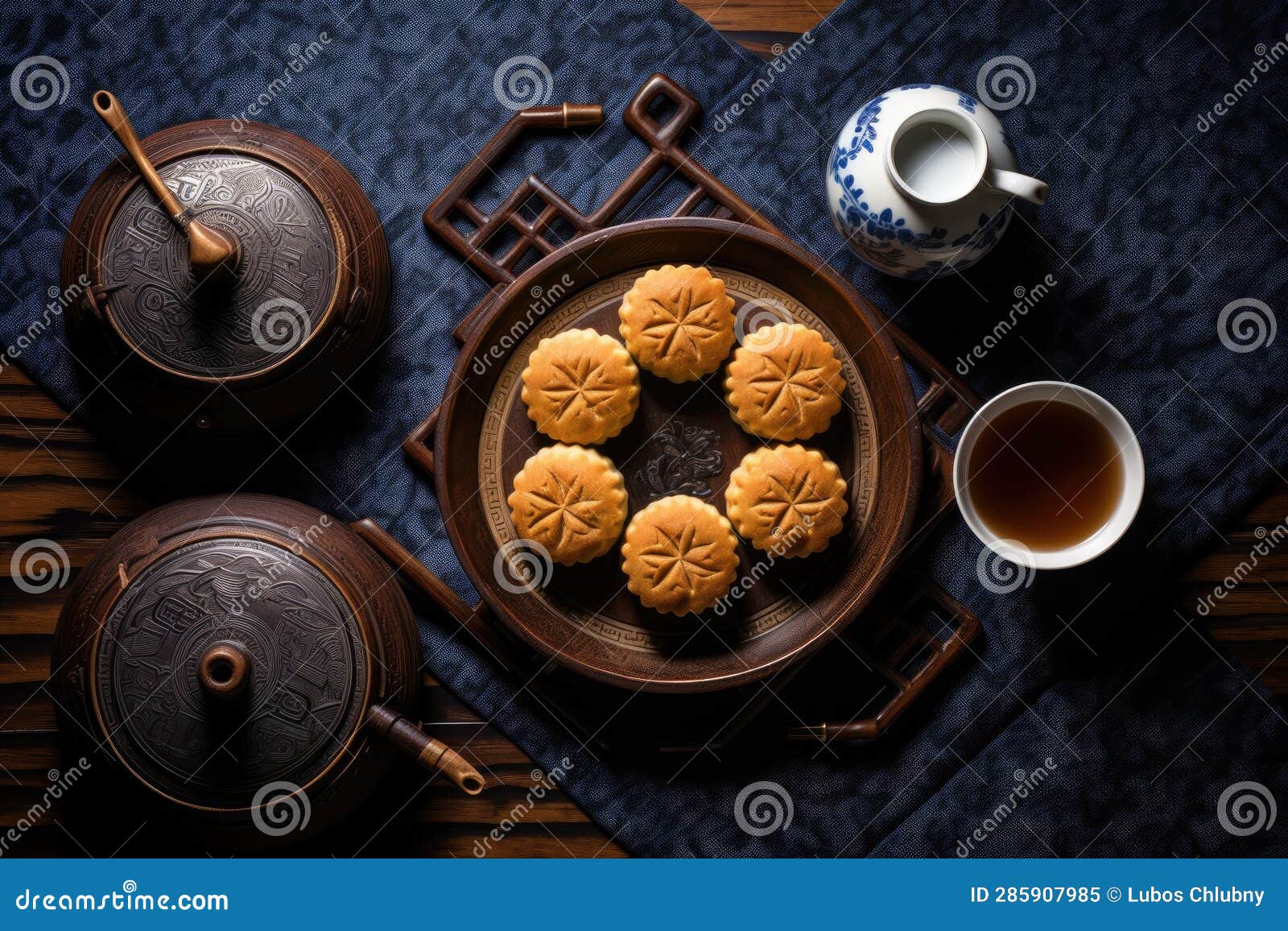 Top View of Traditional Moon Cakes, Tea Pot and Cups on Table Stock ...