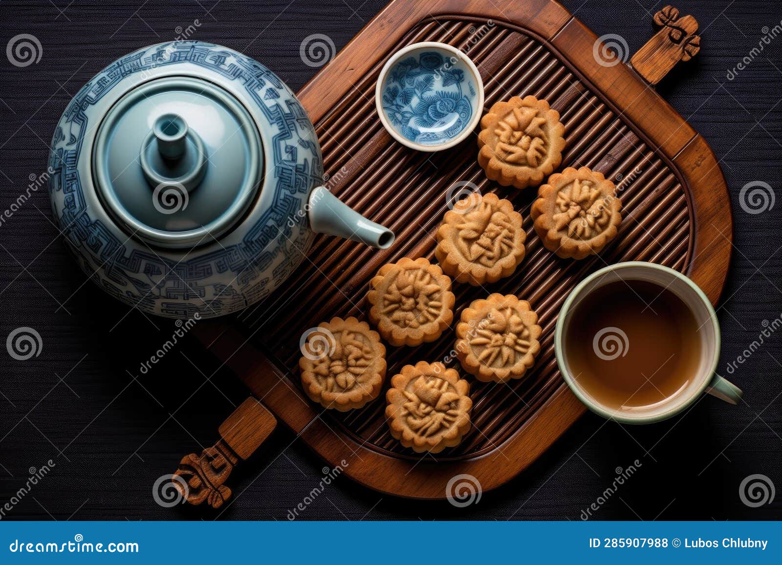 Top View of Traditional Moon Cakes, Tea Pot and Cups on Table Stock ...